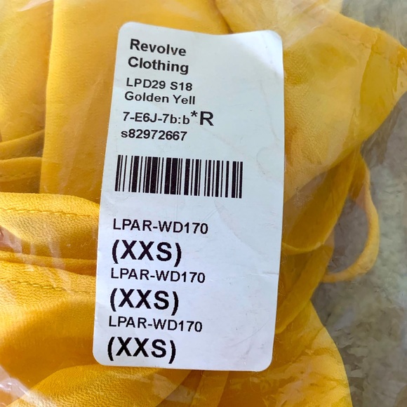 REVOLVE | Dresses | Revolve Asymmetrical Ruffle Wrap Dress | Poshmark